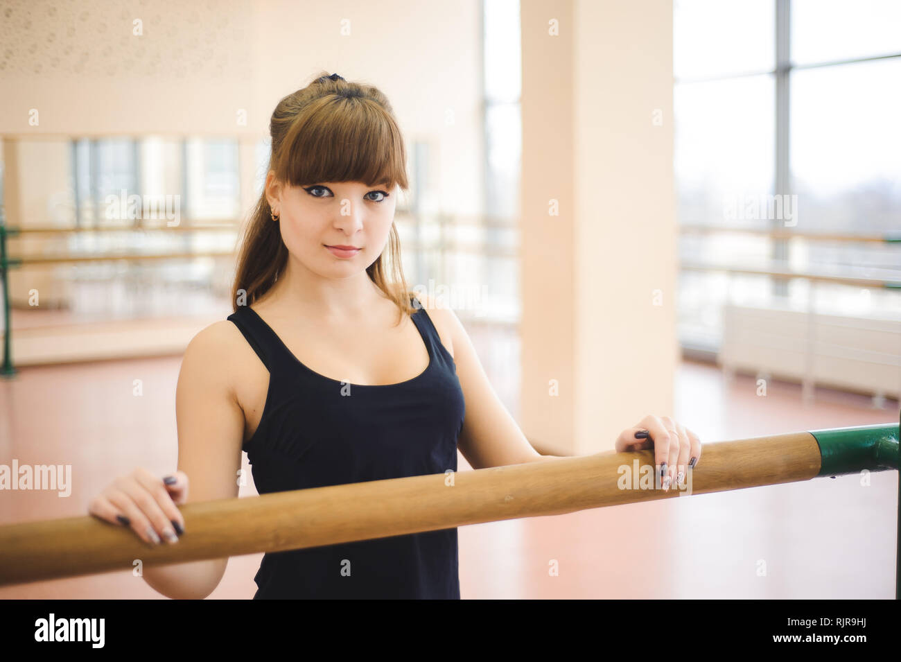 Dancer is doing exercises in the ballet class Stock Photo - Alamy