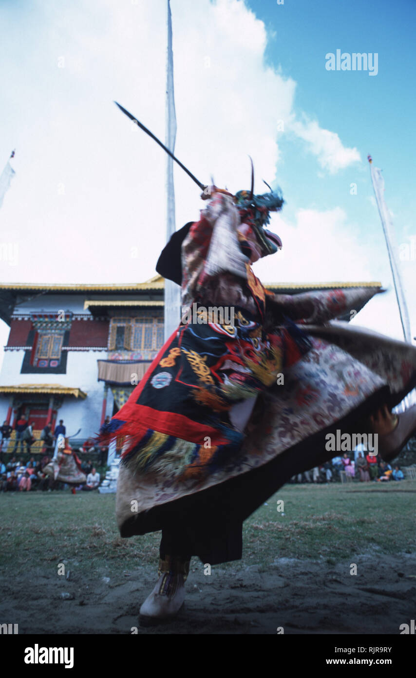 Caption: Pemagantse, Sikkim, India - Feb 2003. A masked dancer (monk ...