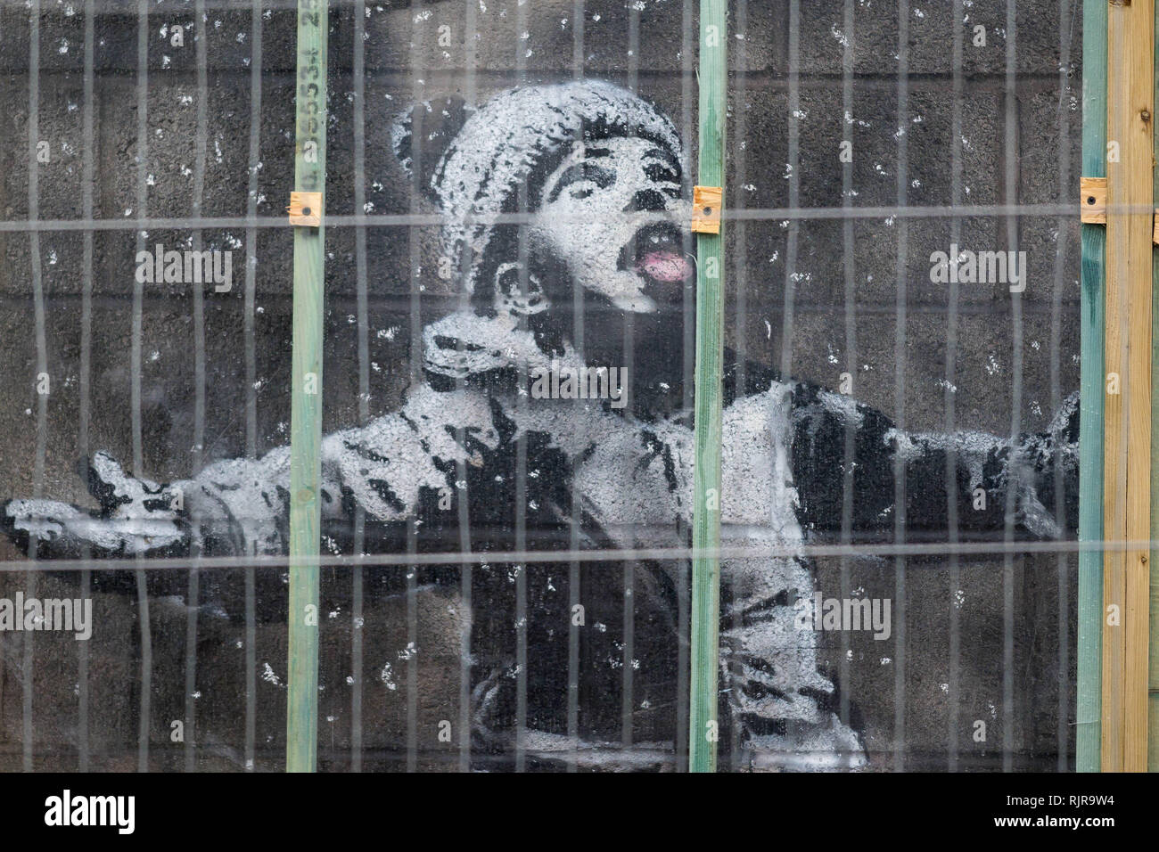 Graffiti artwork by Bristol based graffiti artist Banksy in Port Talbot ...
