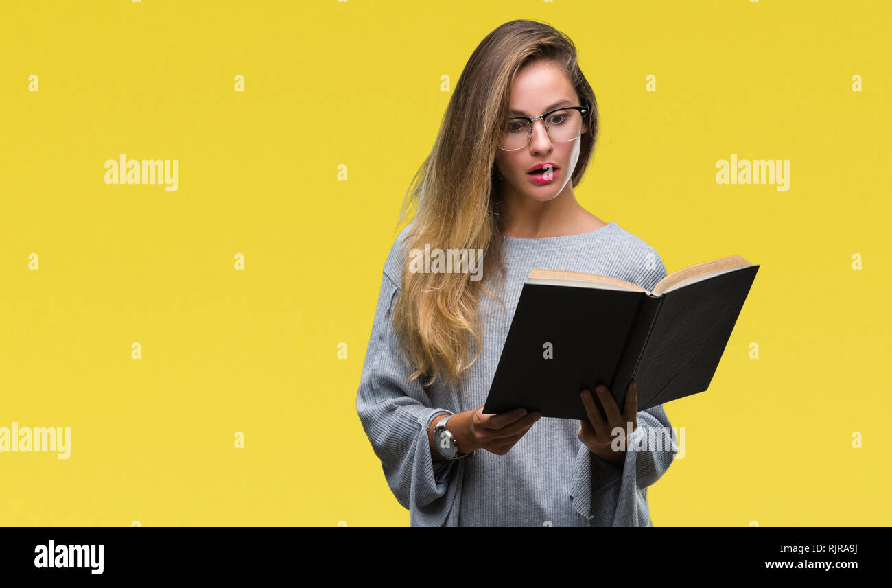 Woman shock reading book library hi-res stock photography and images ...