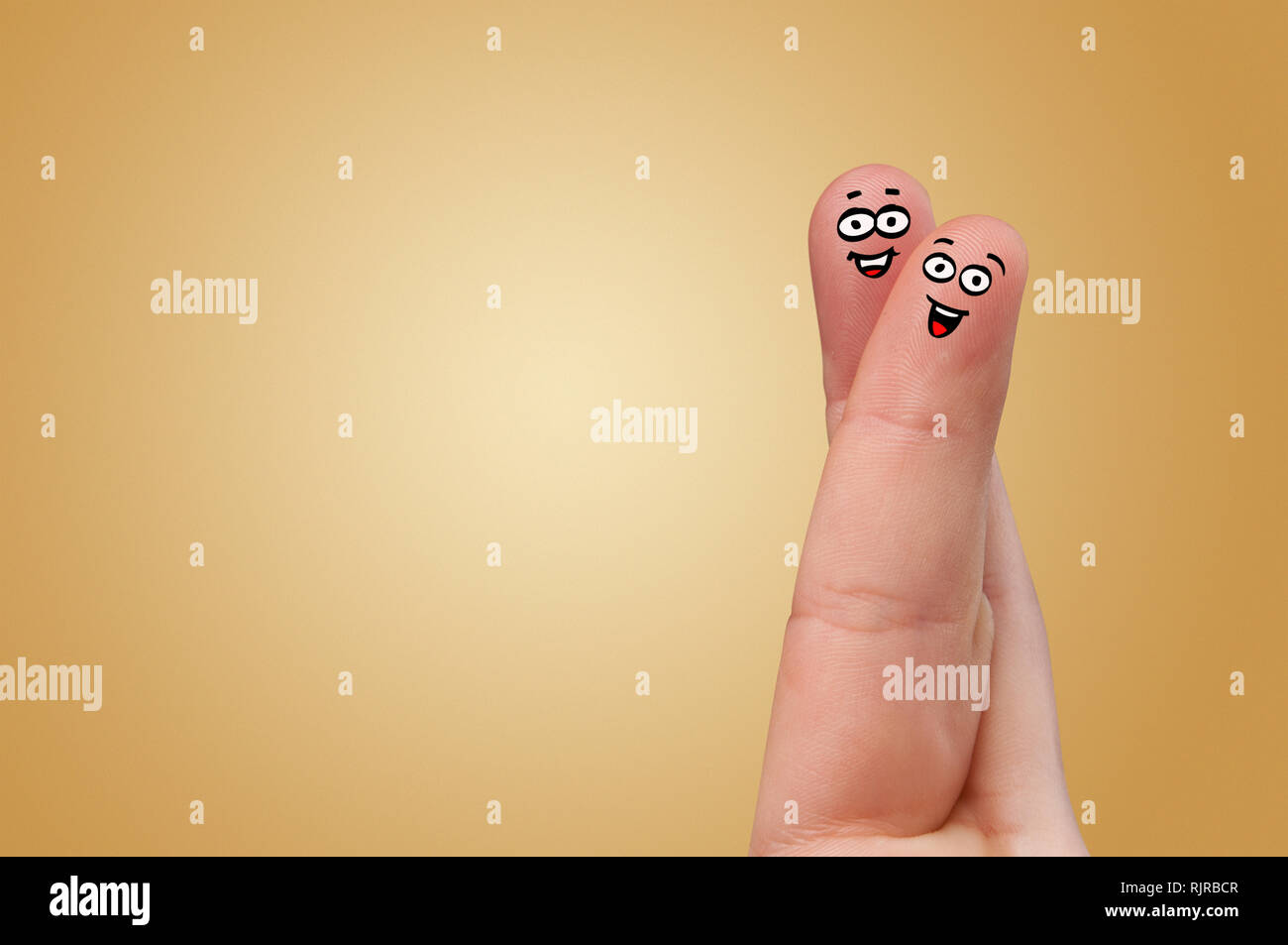 Happy face fingers hug each other Stock Photo - Alamy