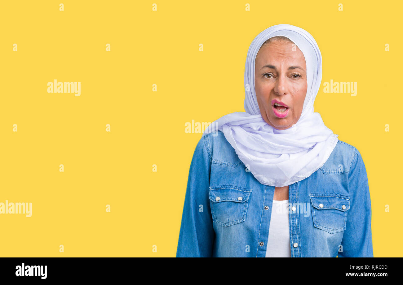 Middle age eastern arab woman wearing arabian hijab over isolated ...