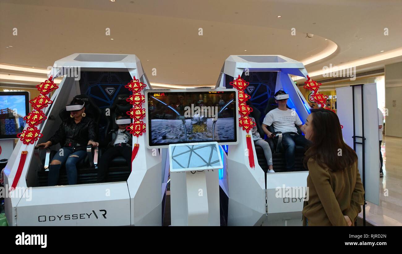 Shenzhen, China: people experience virtual reality toys Stock Photo - Alamy