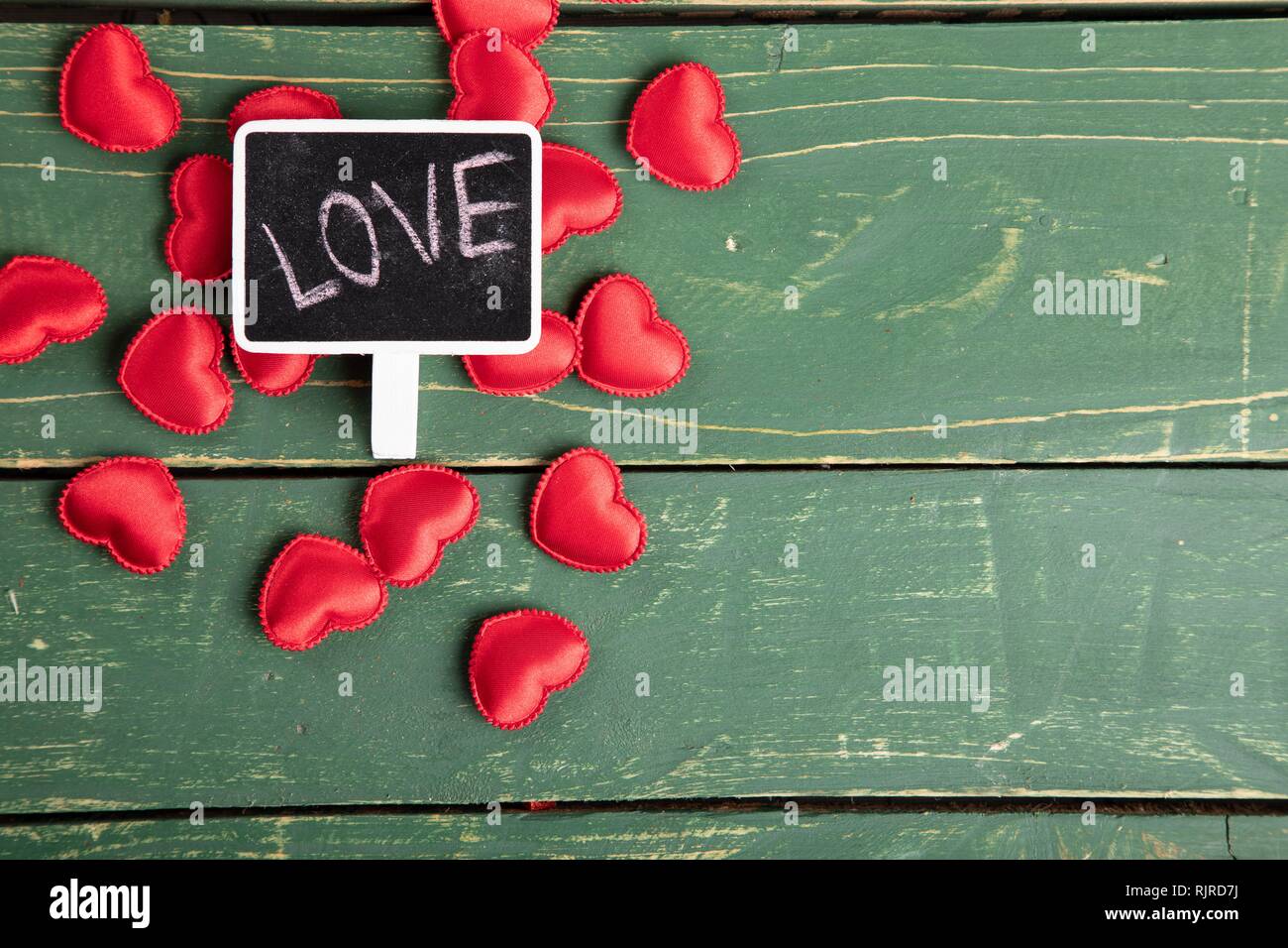 Love writing with hearts Stock Photo - Alamy