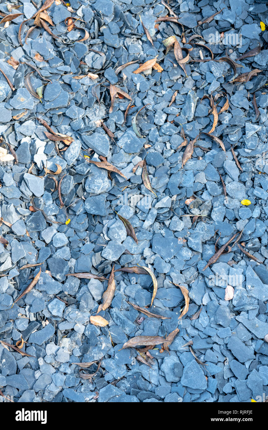 Slate mulch in a plantbed Stock Photo - Alamy