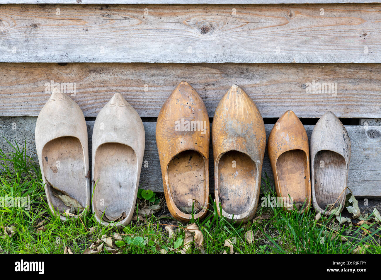 Decorative wooden clogs in a garden Stock Photo - Alamy