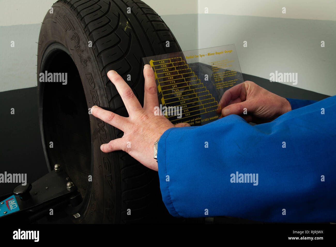 Car tyre repair Stock Photo - Alamy