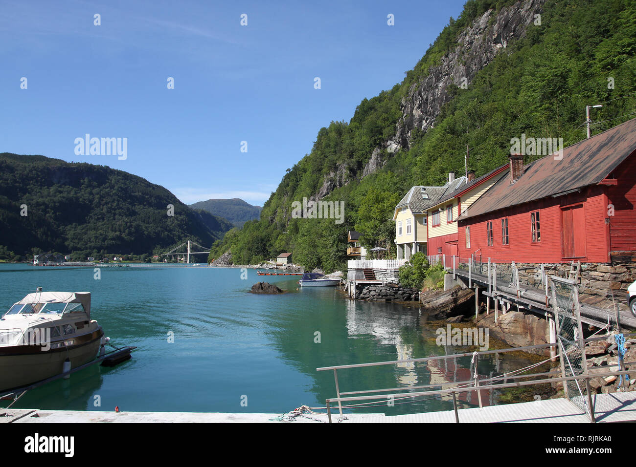 Norway - Hardanger fjord marina with anchored motorboats. Seaside ...