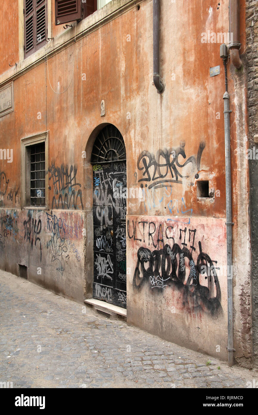 Rome, Italy. Street view of graffiti vandalism Stock Photo - Alamy