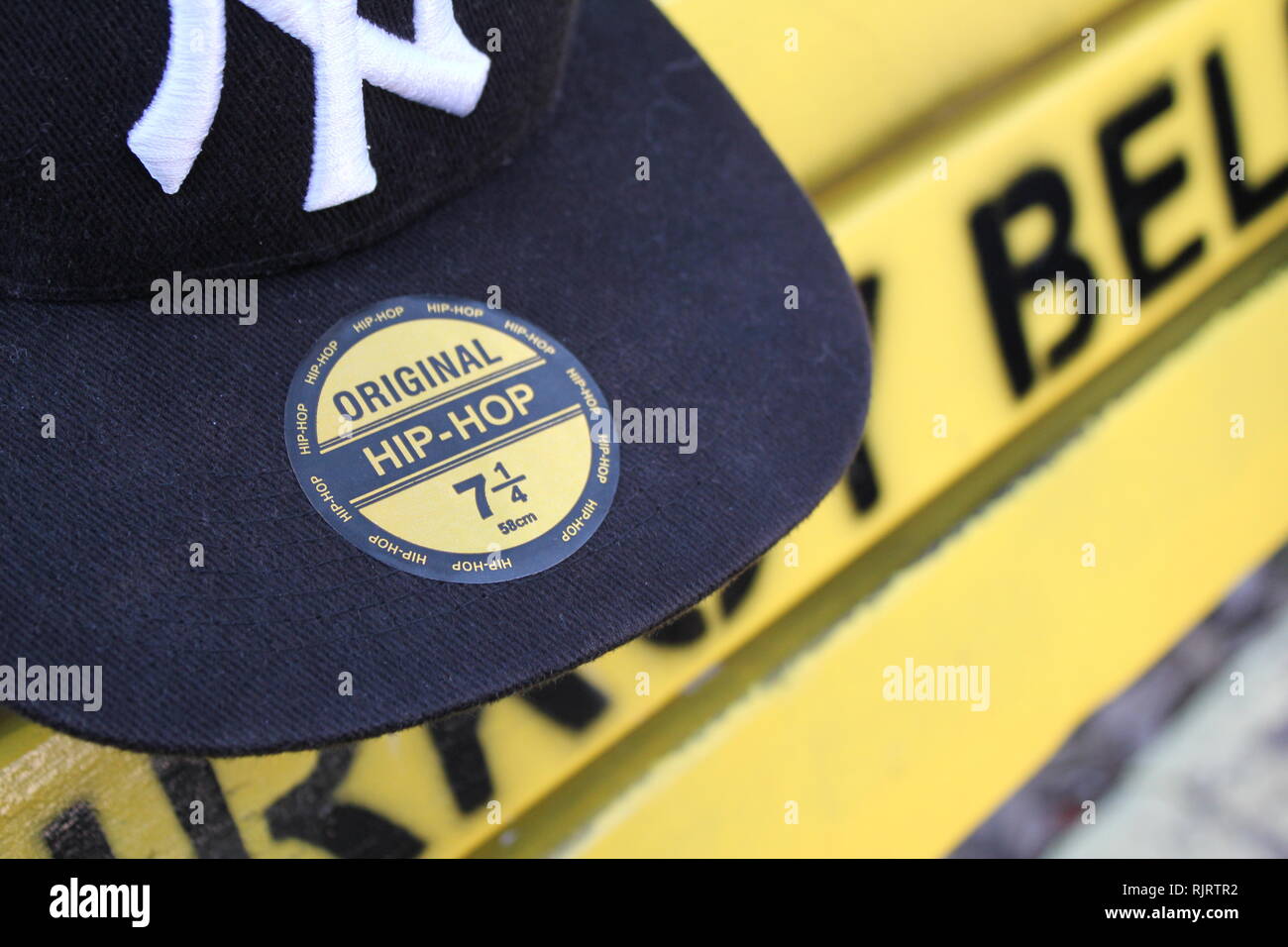 cap on bench Stock Photo - Alamy