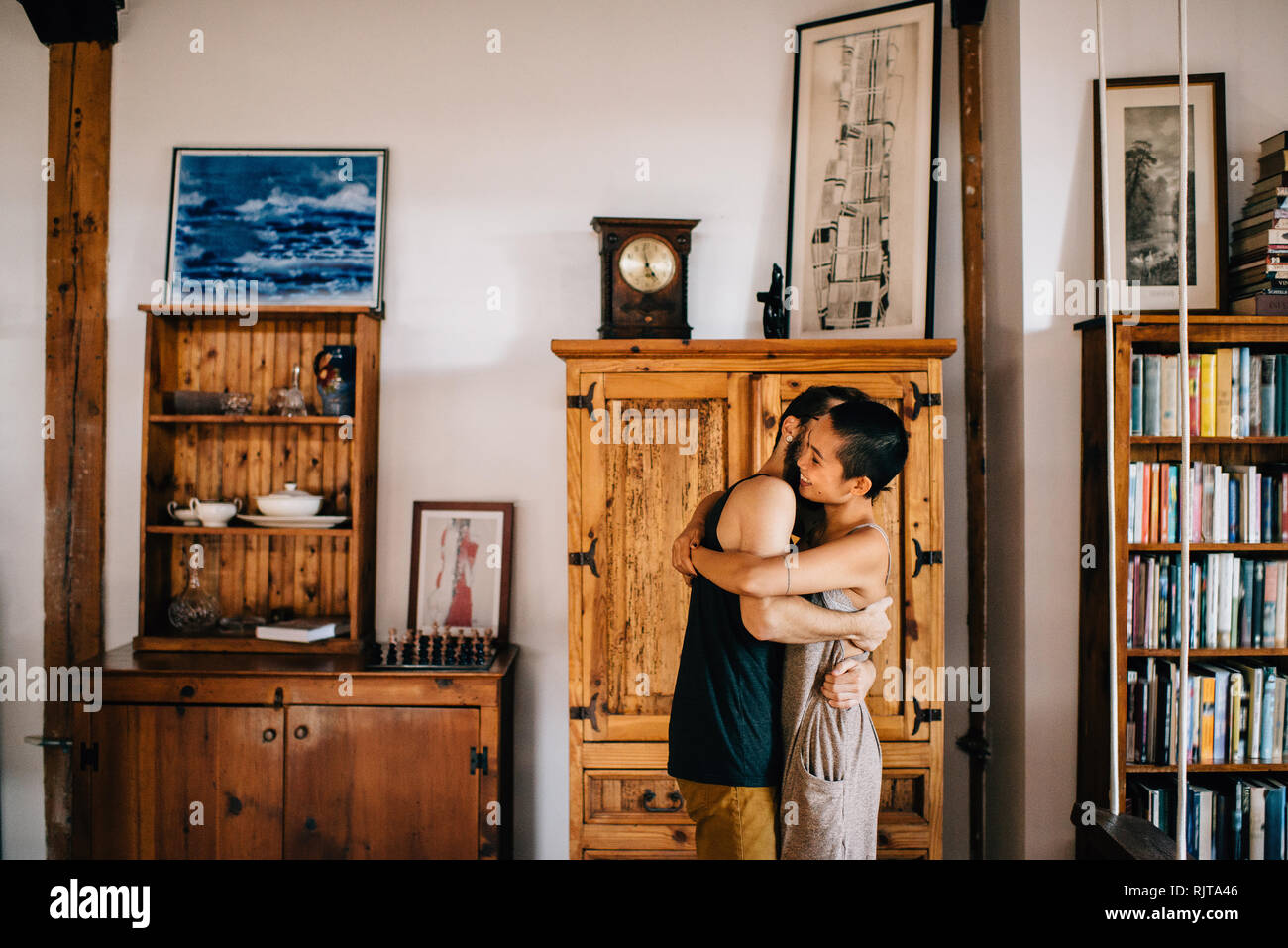 Hugging home hi-res stock photography and images - Alamy