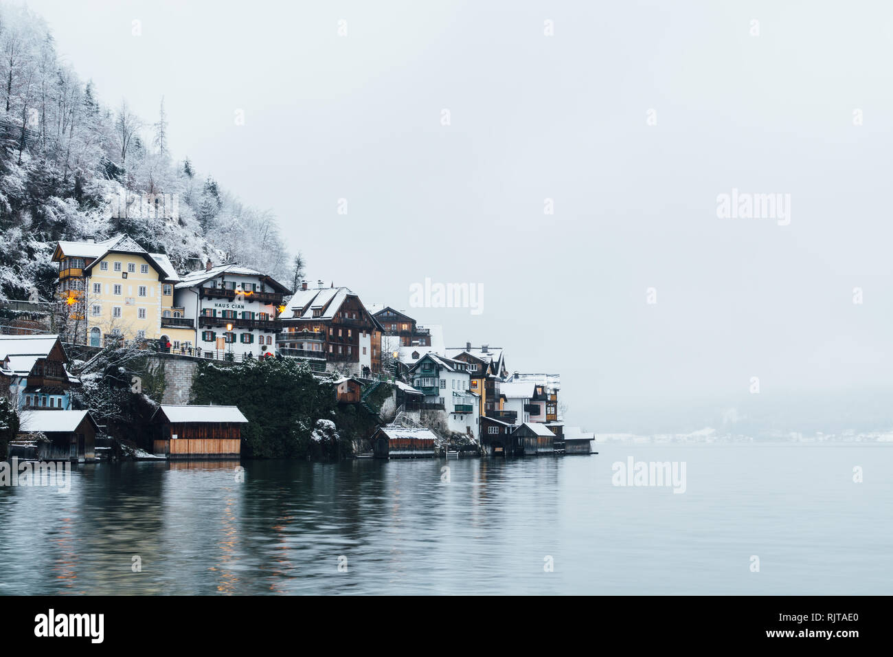 HALLSTATT, AUSTRIA - DECEMBER 2018: view over wooden houses of old town ...