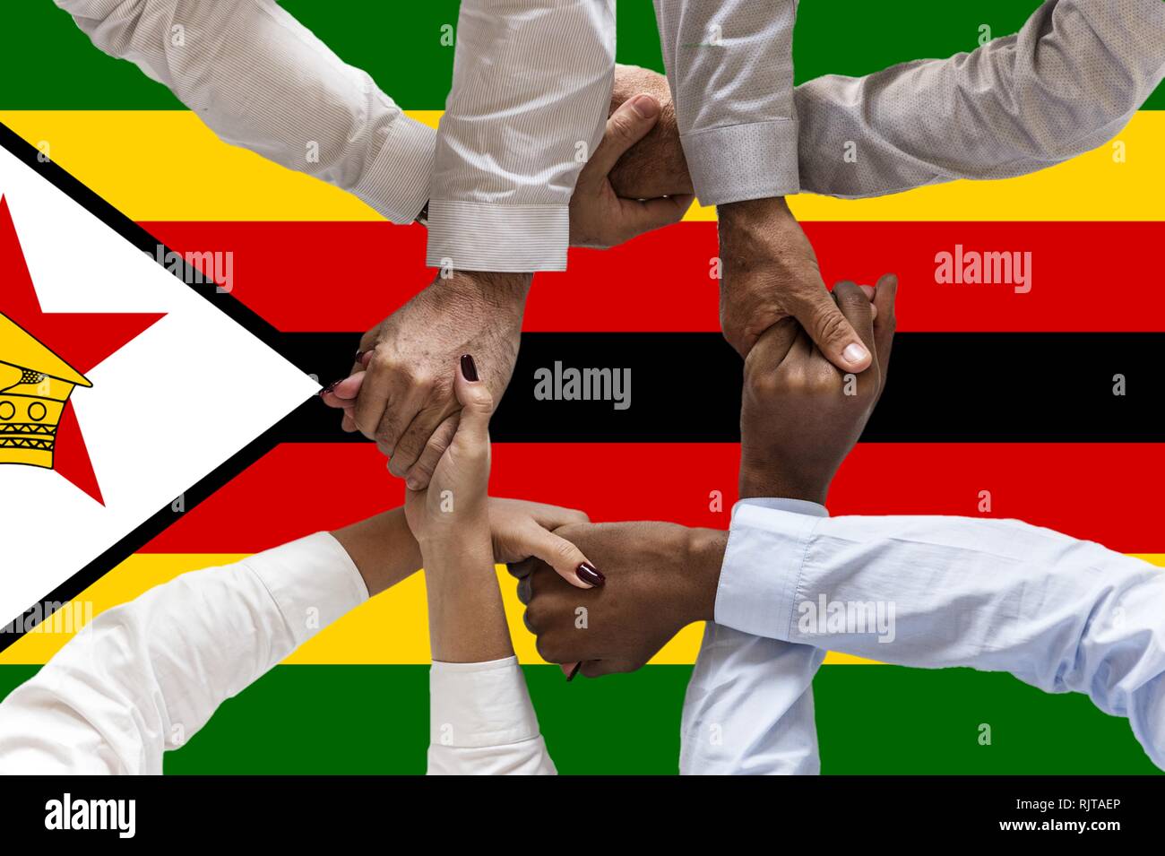 Zimbabwe flag, intergration of a multicultural group of young people ...