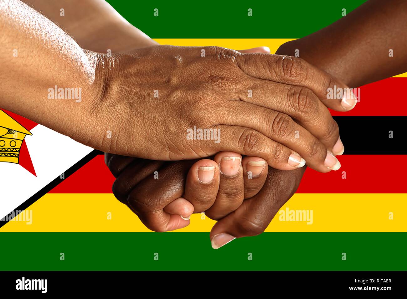 Zimbabwe flag, intergration of a multicultural group of young people ...