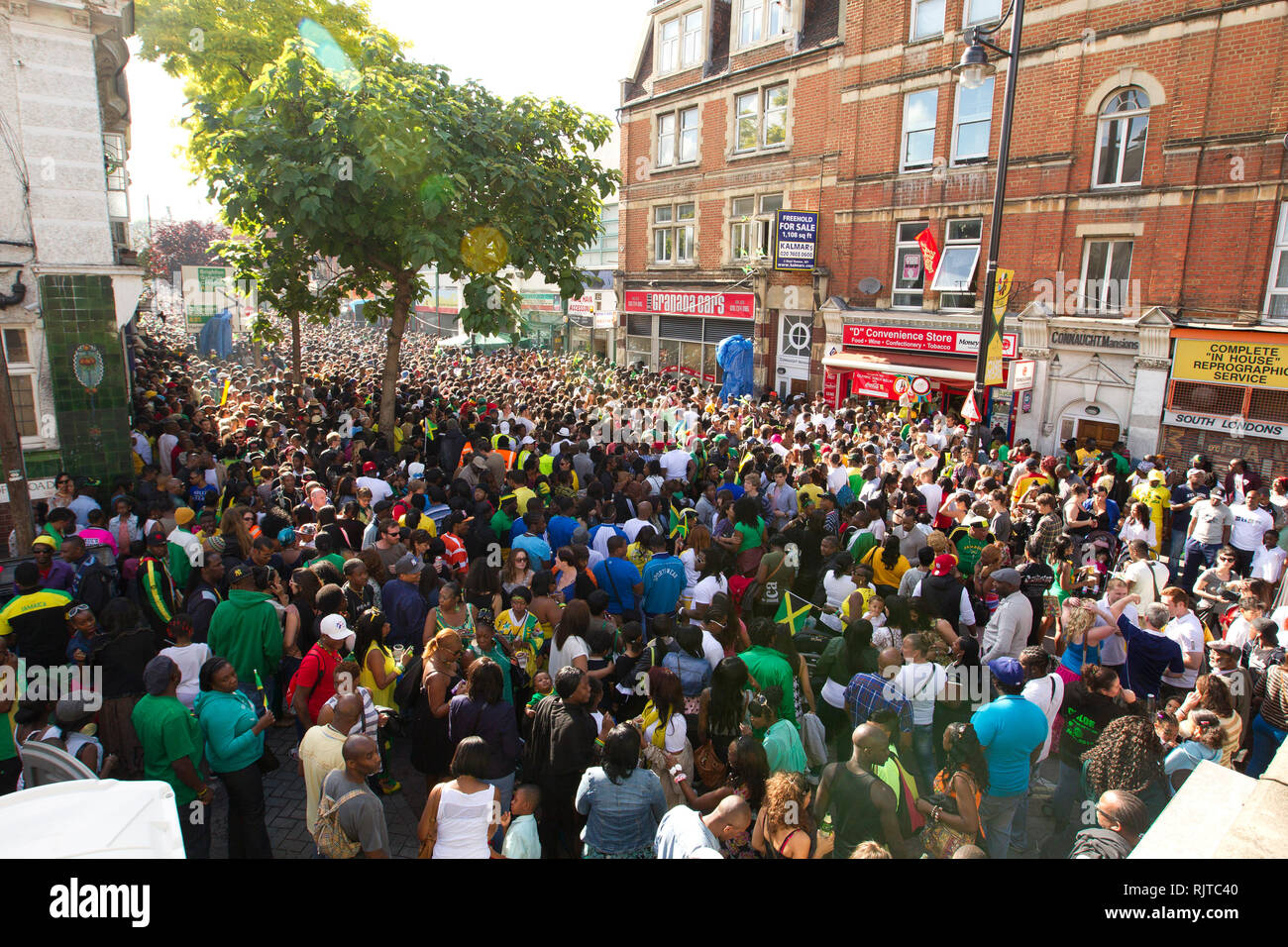 People gather for the annual 'Brixton Splash,' to mark Jamaican ...