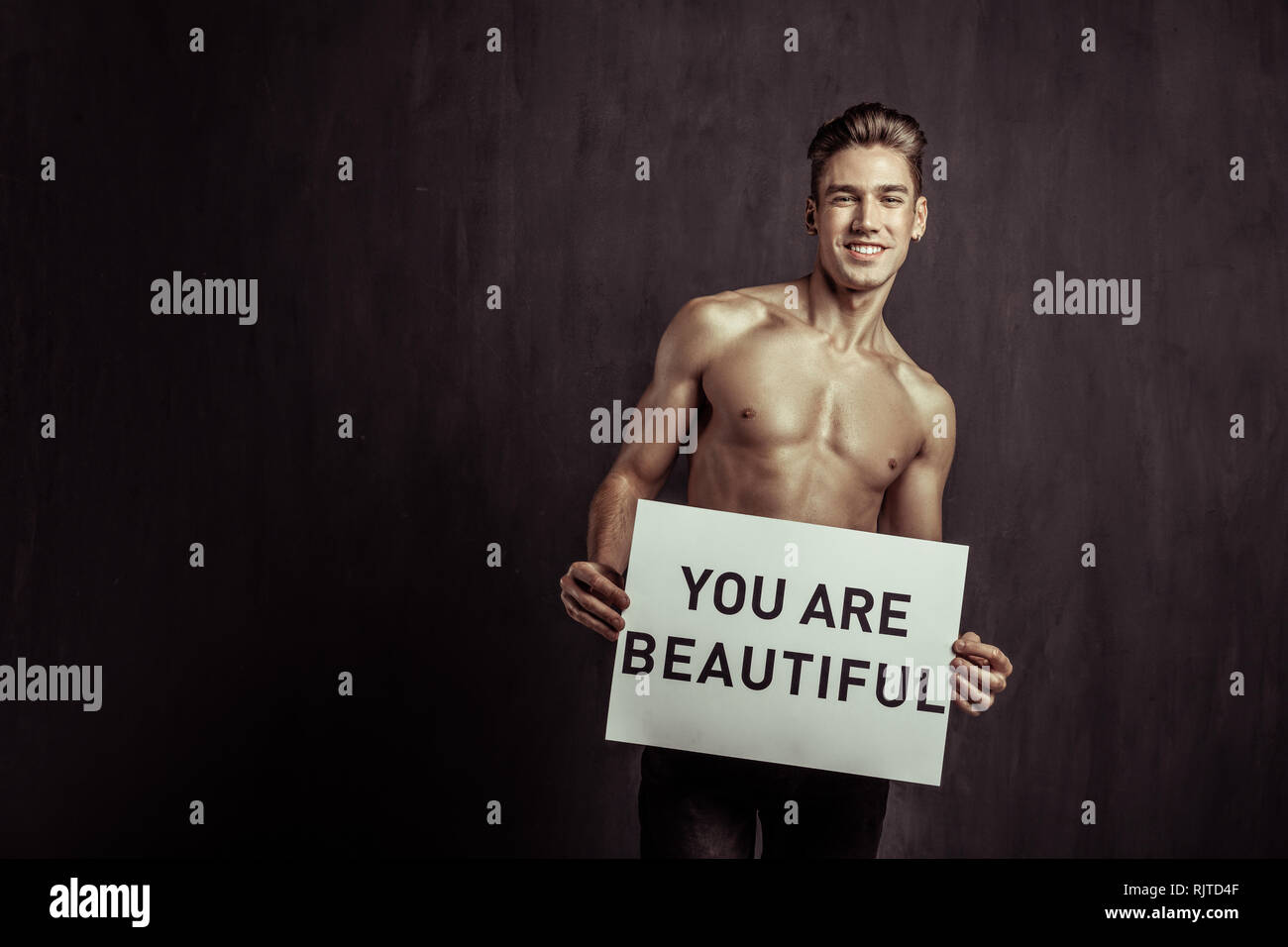 Positive good looking man trying to motivate you Stock Photo - Alamy