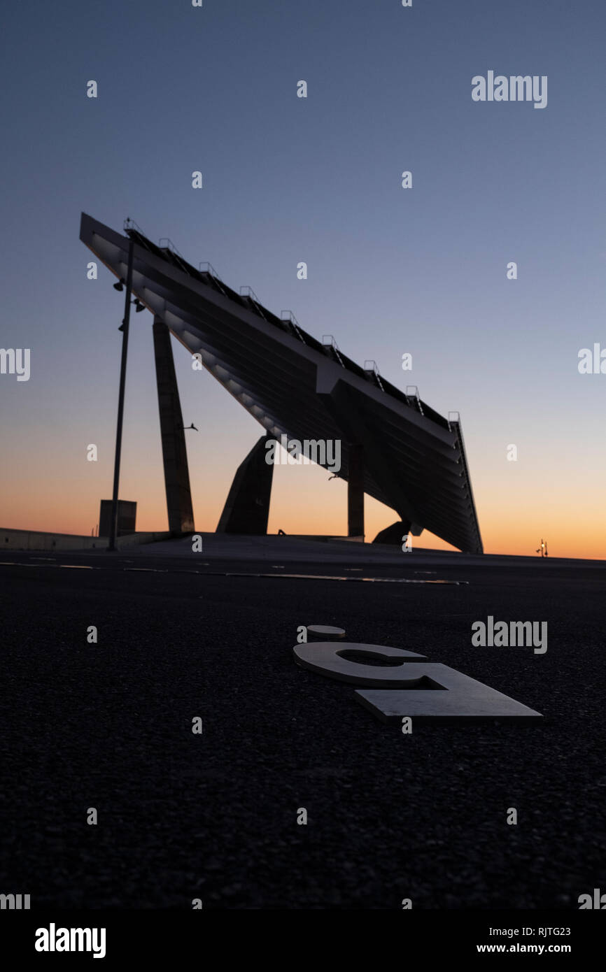 Solar Panel Structure Framework silhouetted against the dawn sky with a ...