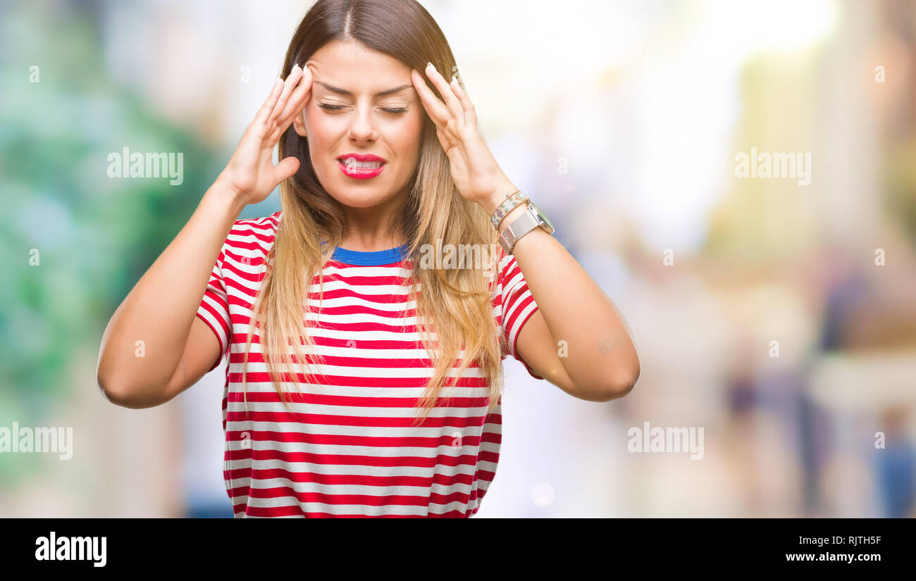 Young beautiful woman casual look over isolated background with hand on ...