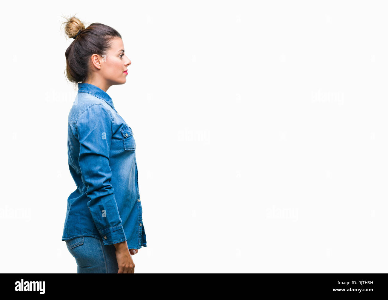 Young beautiful woman over isolated background looking to side, relax ...