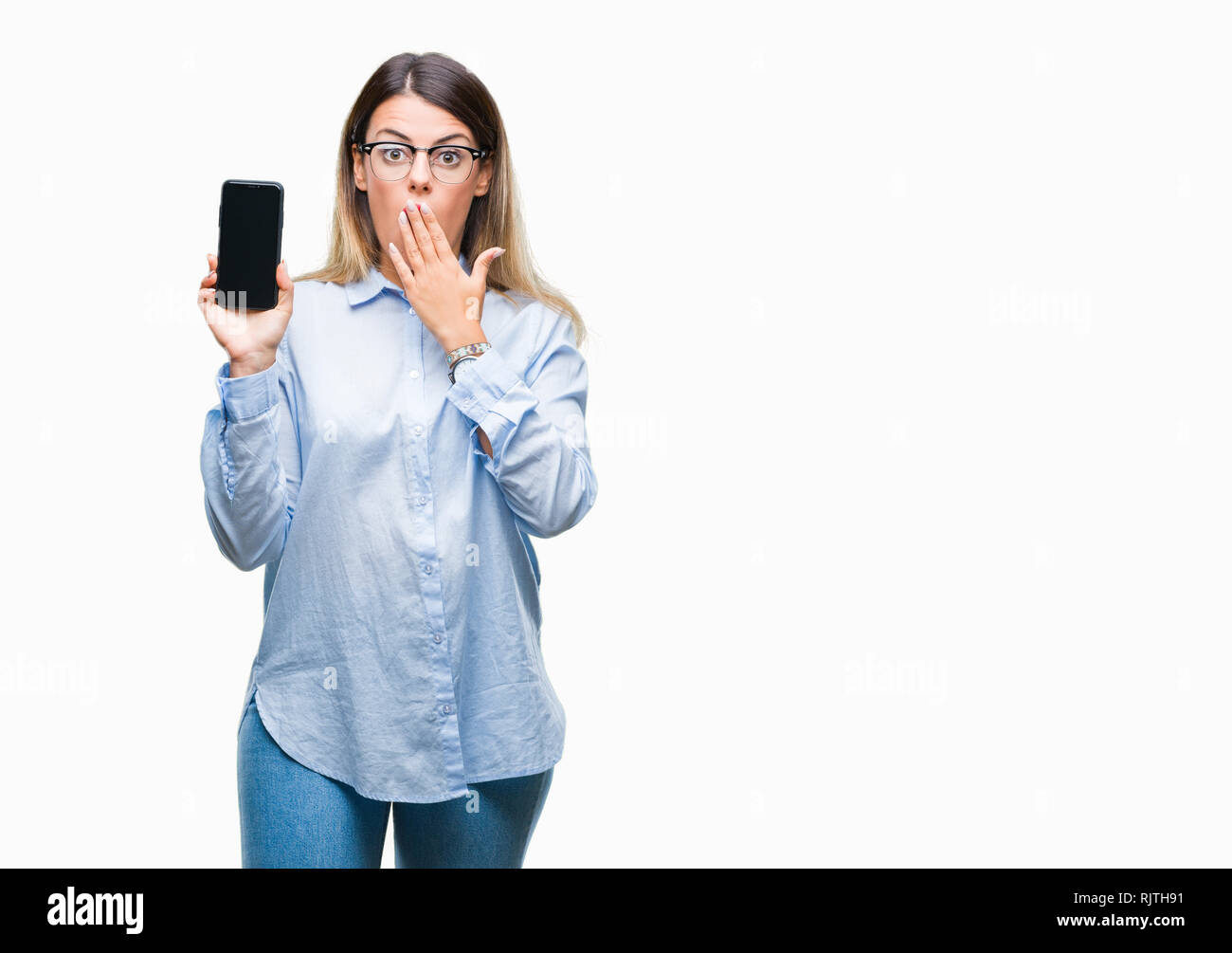 Young beautiful business woman showing blank screen of smartphone over ...