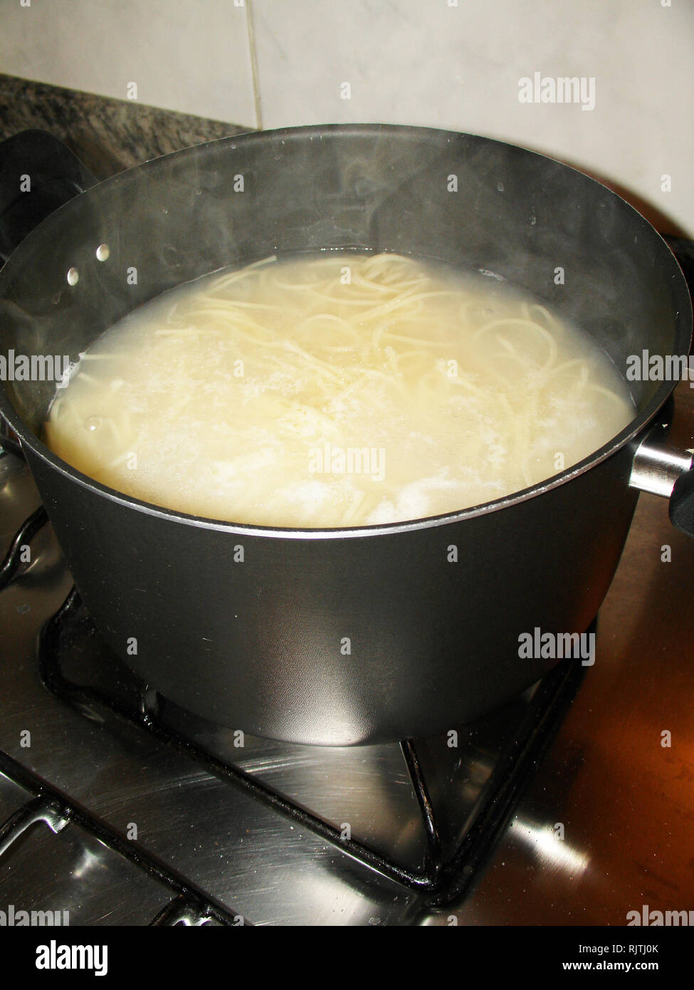 Pasta in boiling water, São Paulo, Brazil Stock Photo - Alamy