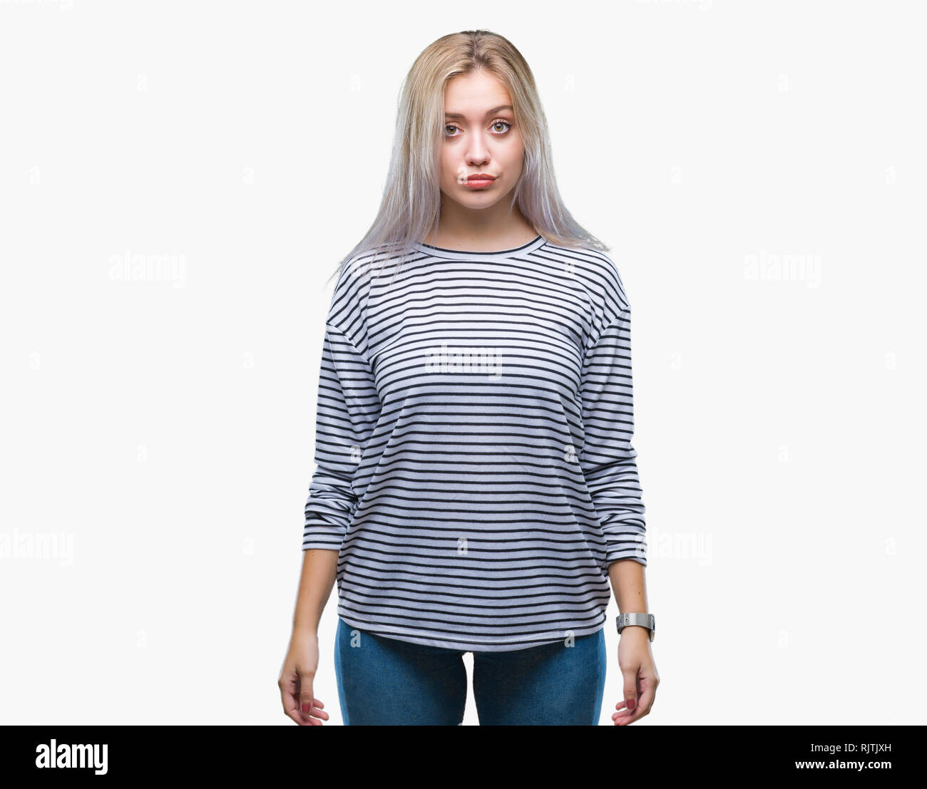 Young blonde woman over isolated background depressed and worry for ...