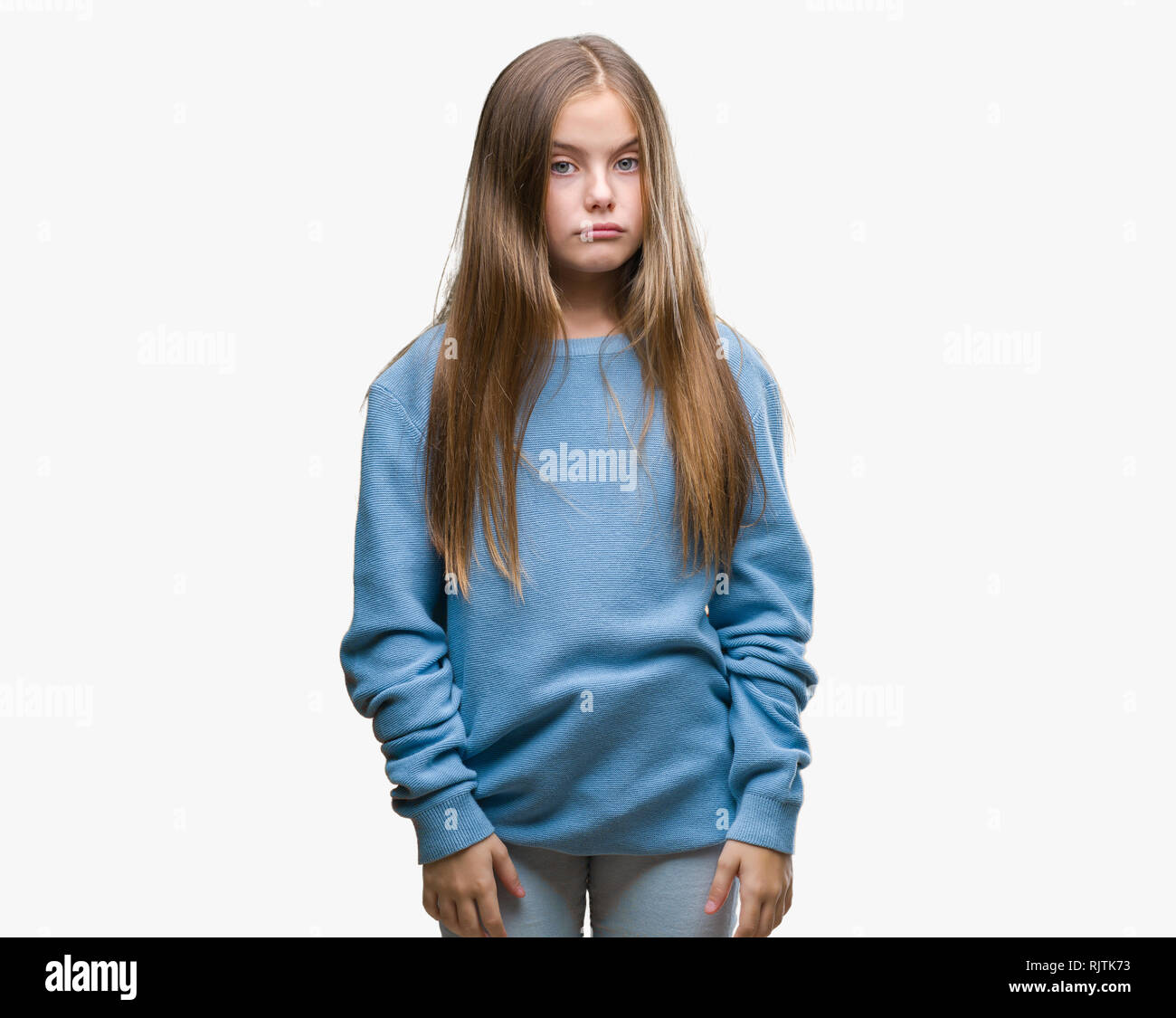 Young beautiful girl wearing winter sweater over isolated background ...