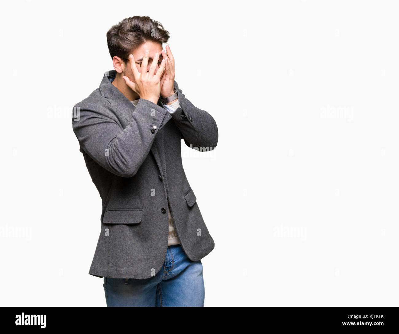 Young business man wearing glasses over isolated background with sad ...