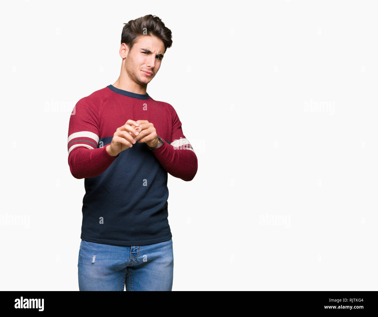 Young handsome man over isolated background disgusted expression ...