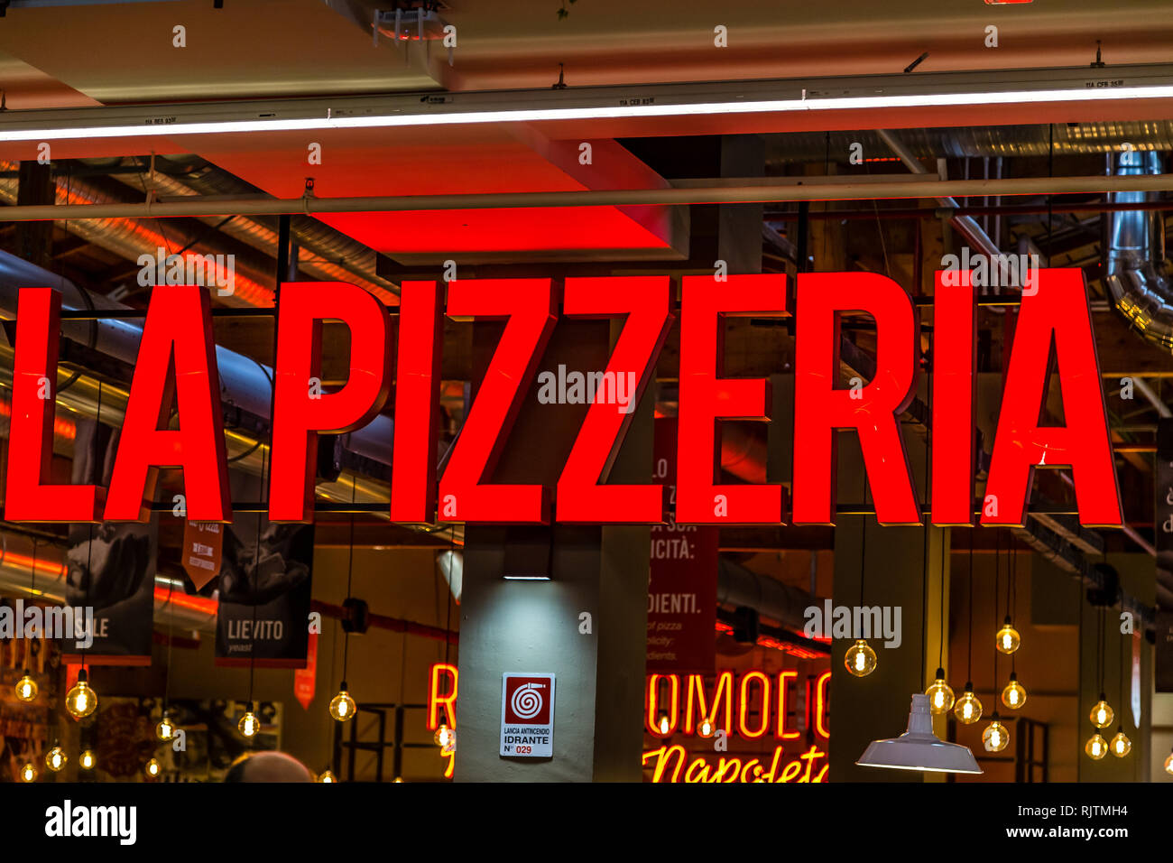 BOLOGNA, ITALY - DECEMBER 16, 2018: lights are enlightening Pizzeria ...