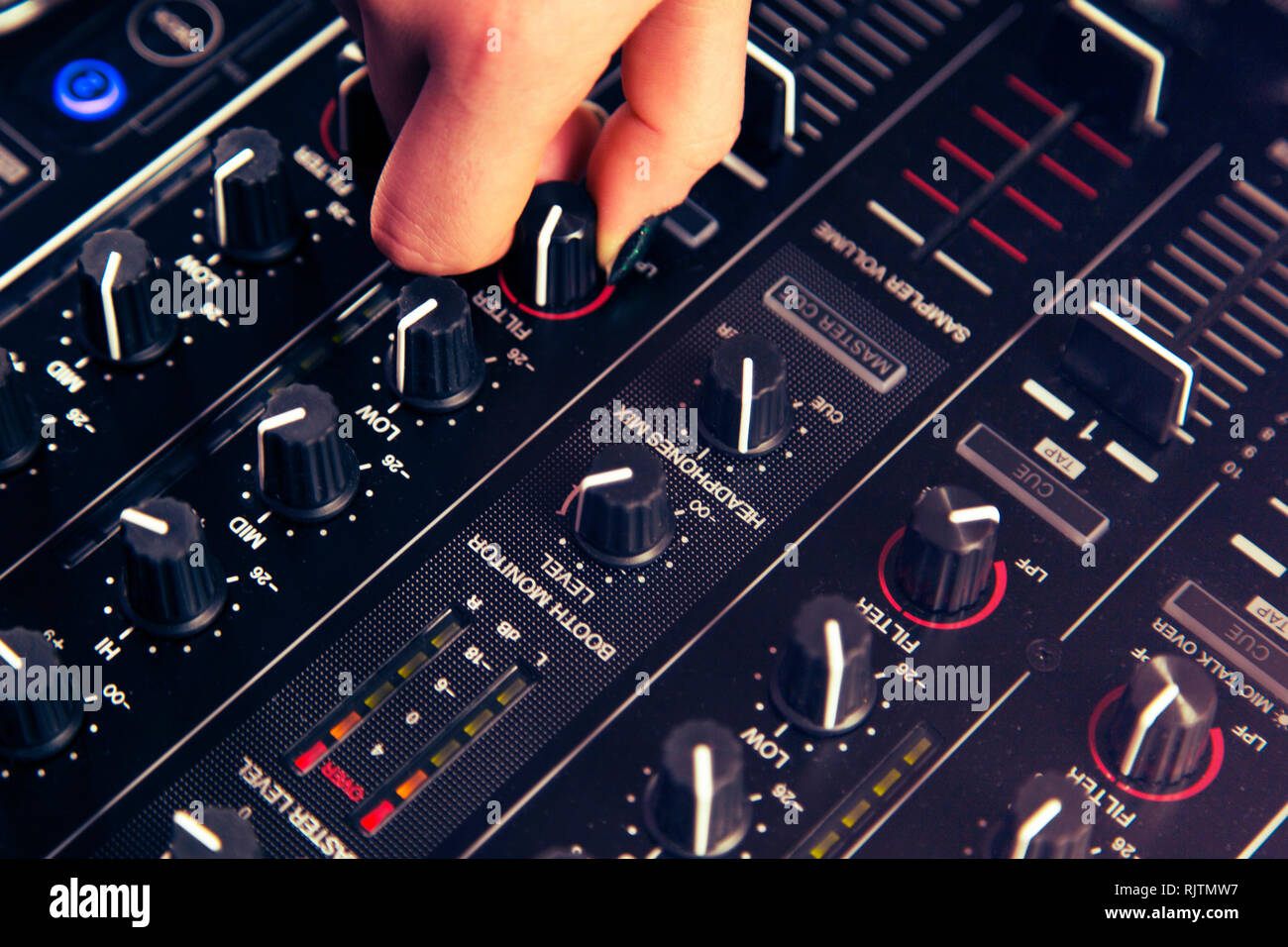 DJ Hand Mixing on Controller Stock Photo - Alamy