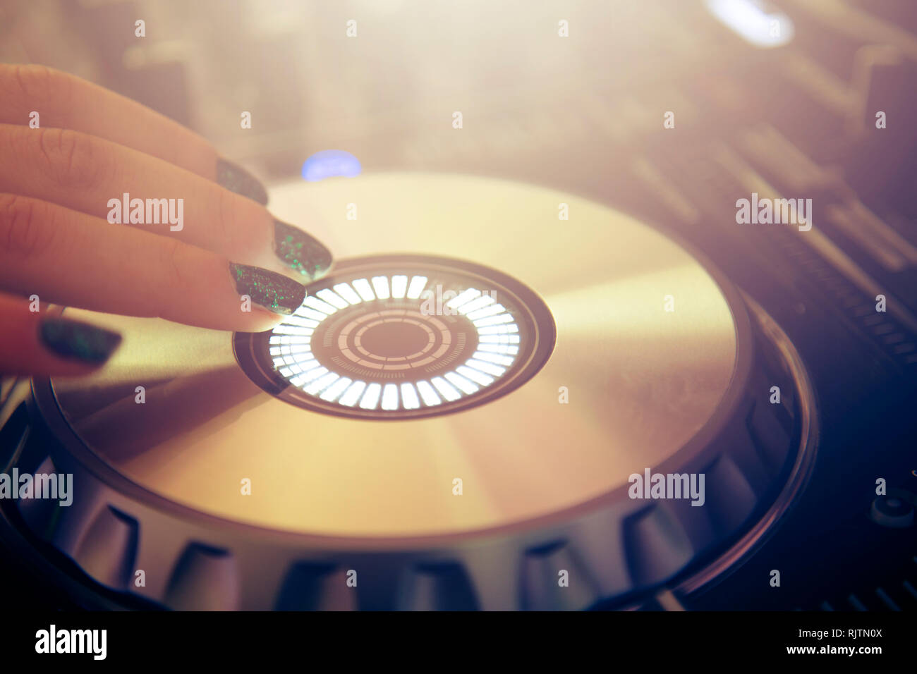 DJ Hand Mixing on Controller Stock Photo - Alamy