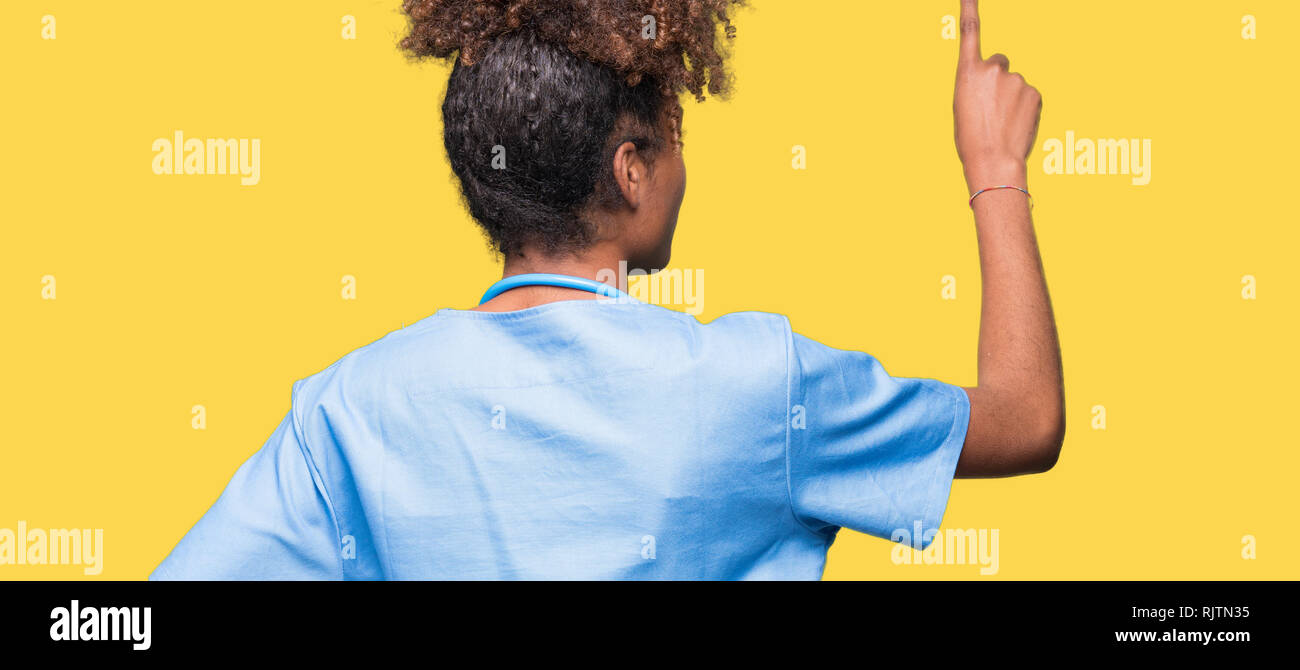 Young african american doctor woman over isolated background Posing ...