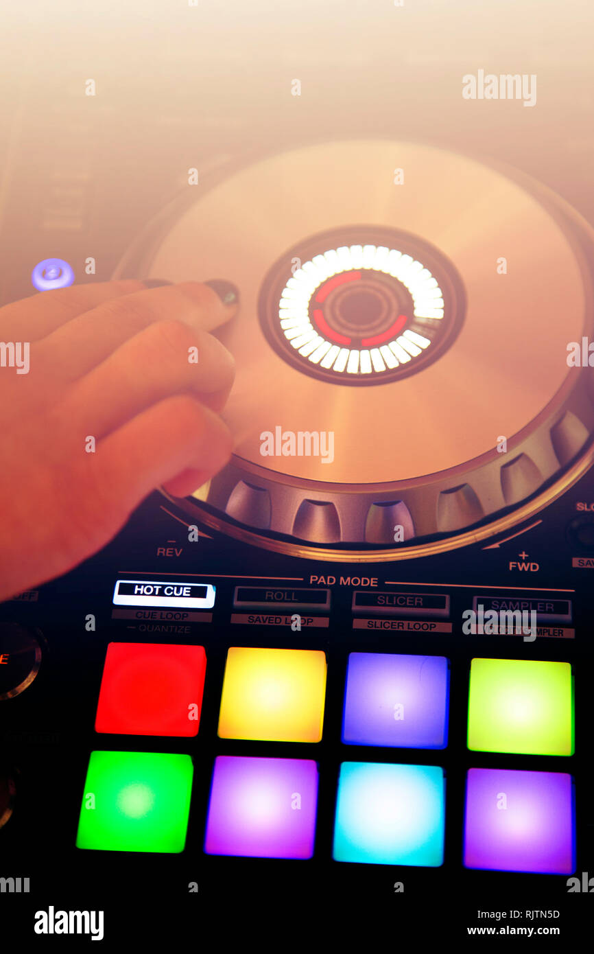DJ Hand Mixing on Controller Stock Photo - Alamy