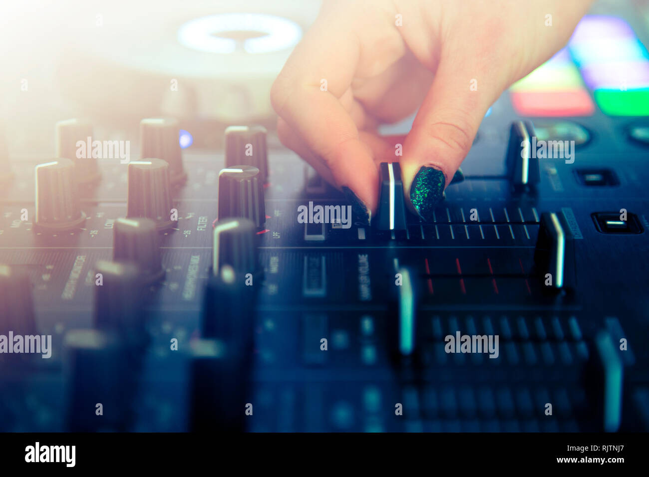 DJ Hand Mixing on Controller Stock Photo - Alamy