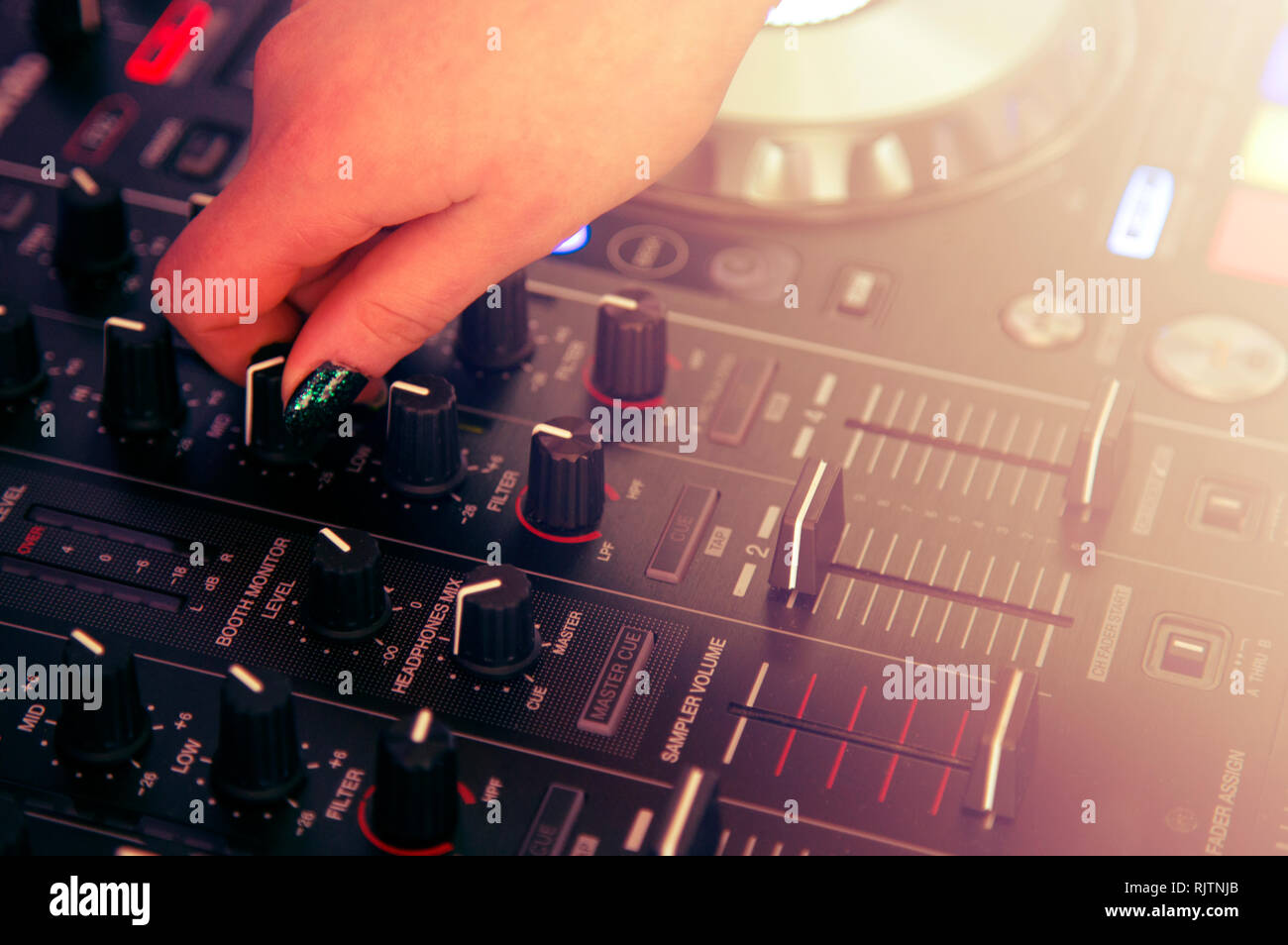 DJ Hand Mixing on Controller Stock Photo - Alamy