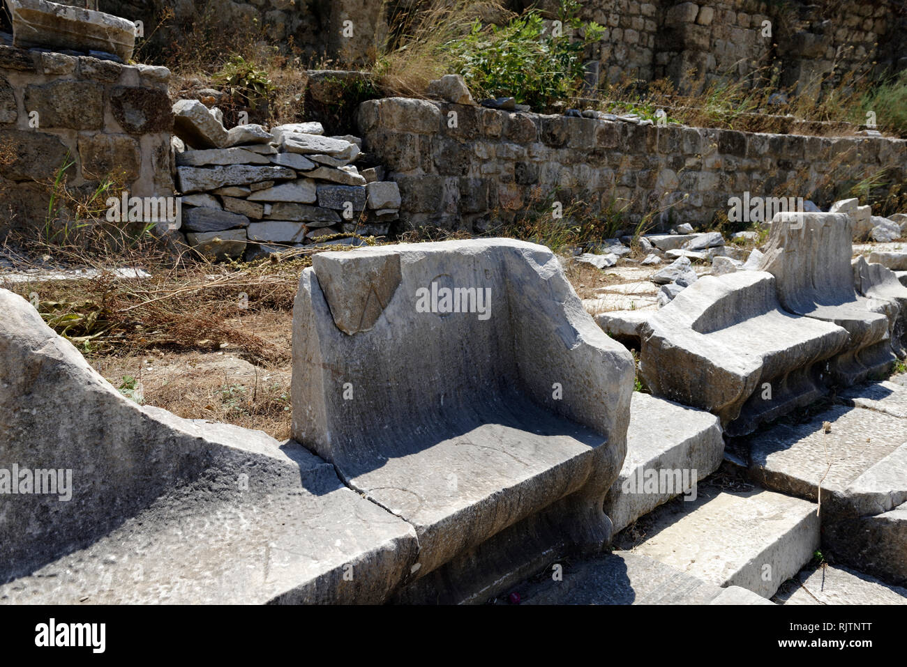 Seating inscribed with Greek letters at the large ancient stadium ...