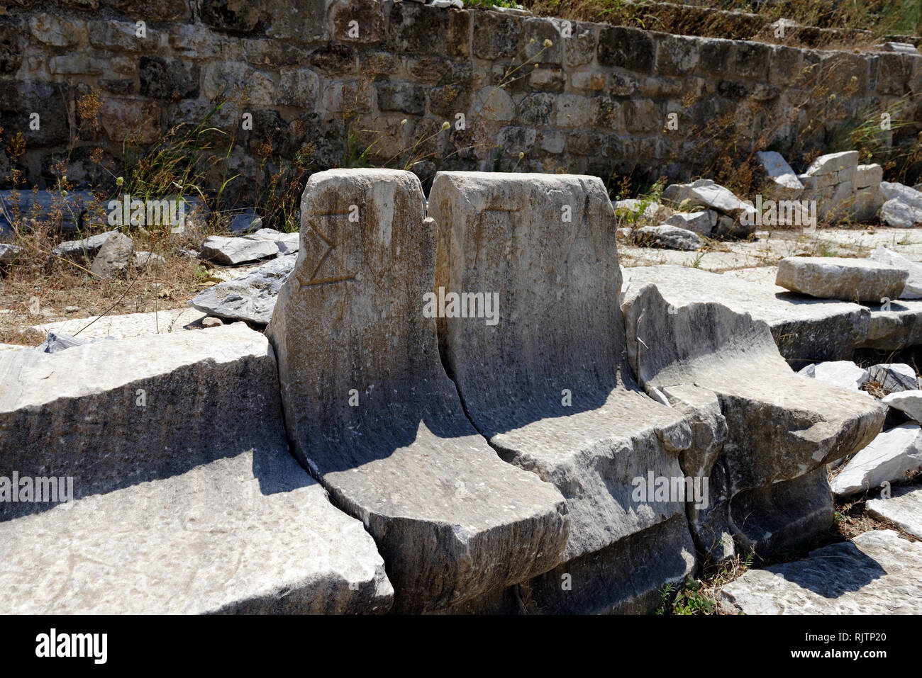 Seating inscribed with Greek letters at the large ancient stadium ...