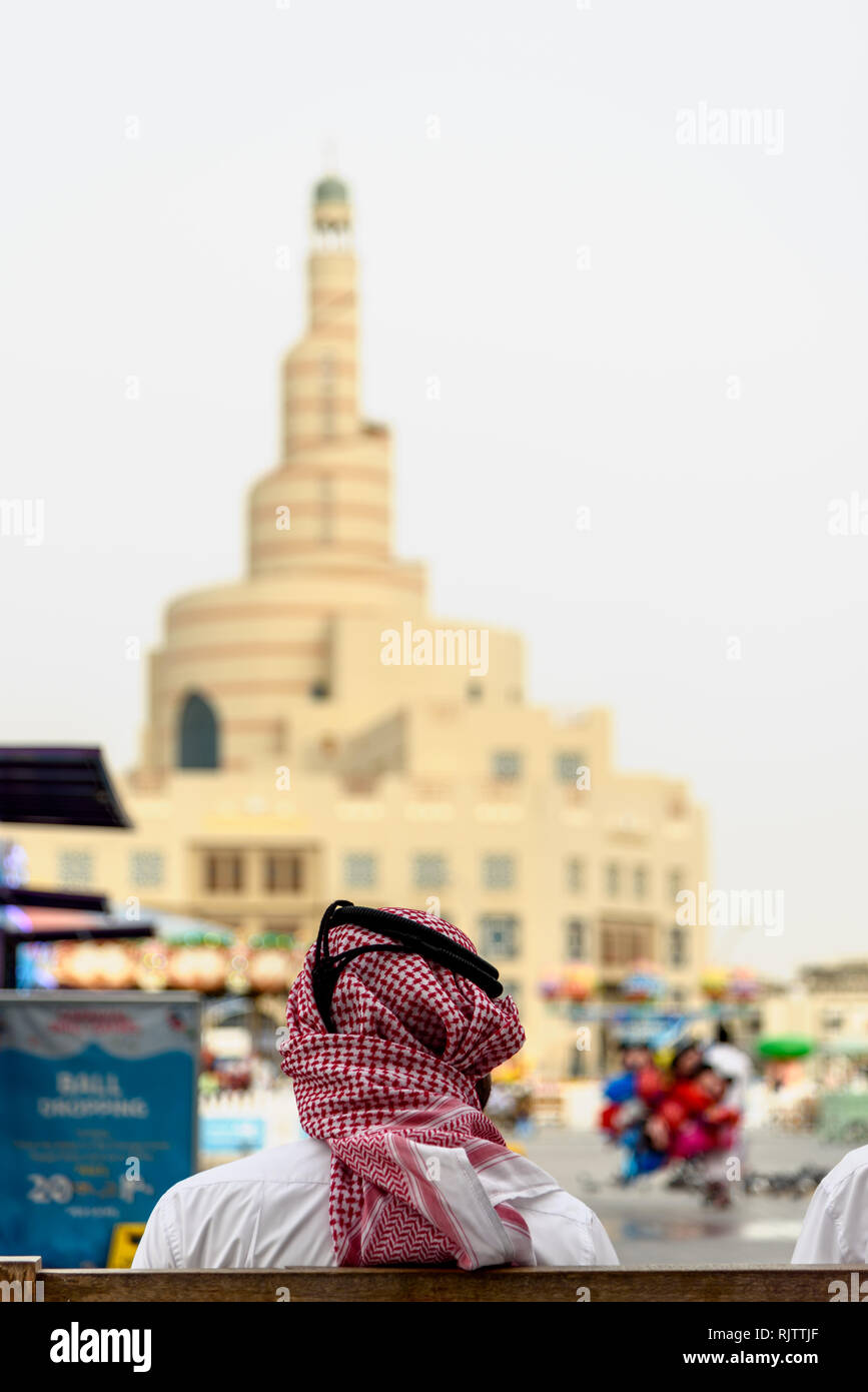 Qatar is an Islamic country, and people dress in a very traditional ...