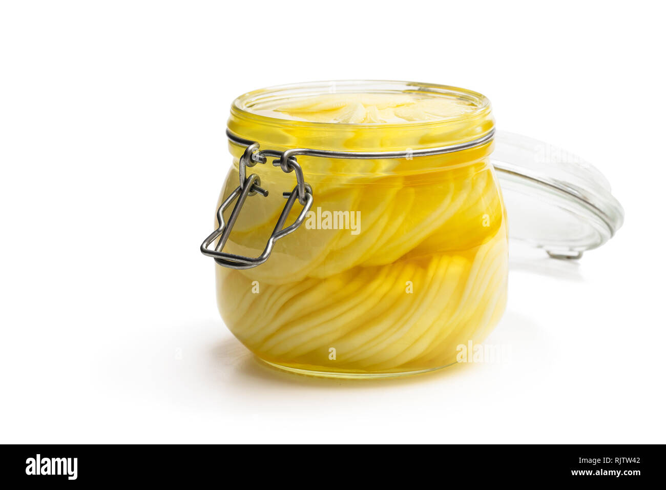 Marinated daikon in glass jar isolated on Stock Photo - Alamy
