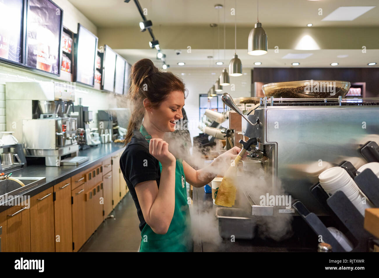 Starbucks worker beverage hi-res stock photography and images - Alamy