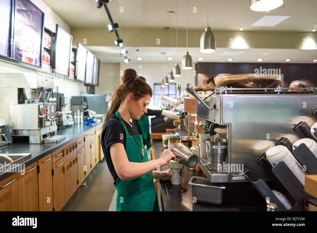 Starbucks worker beverage hi-res stock photography and images - Alamy