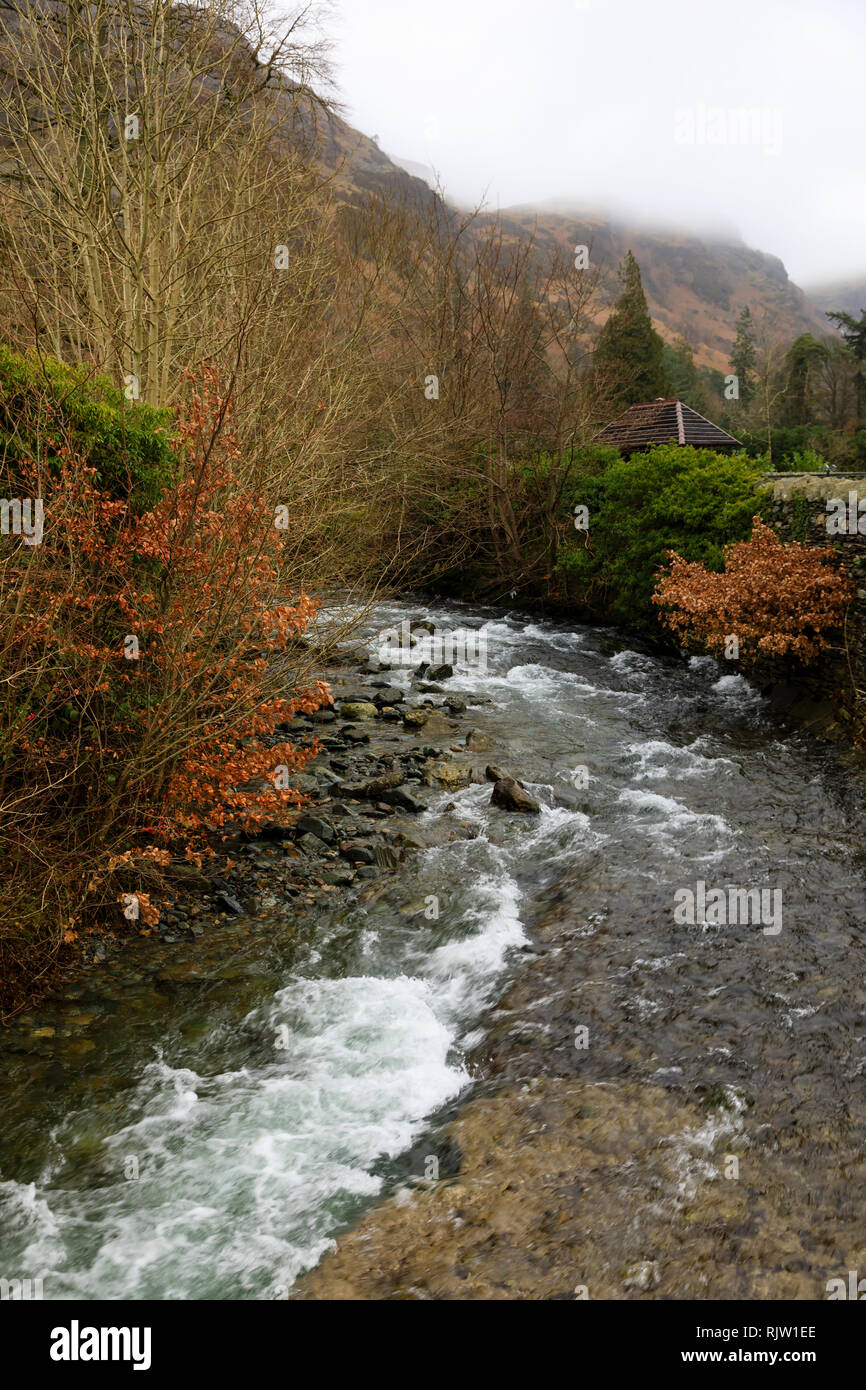Church Beck river flowing through Coniston, Lake District, Cumbria ...