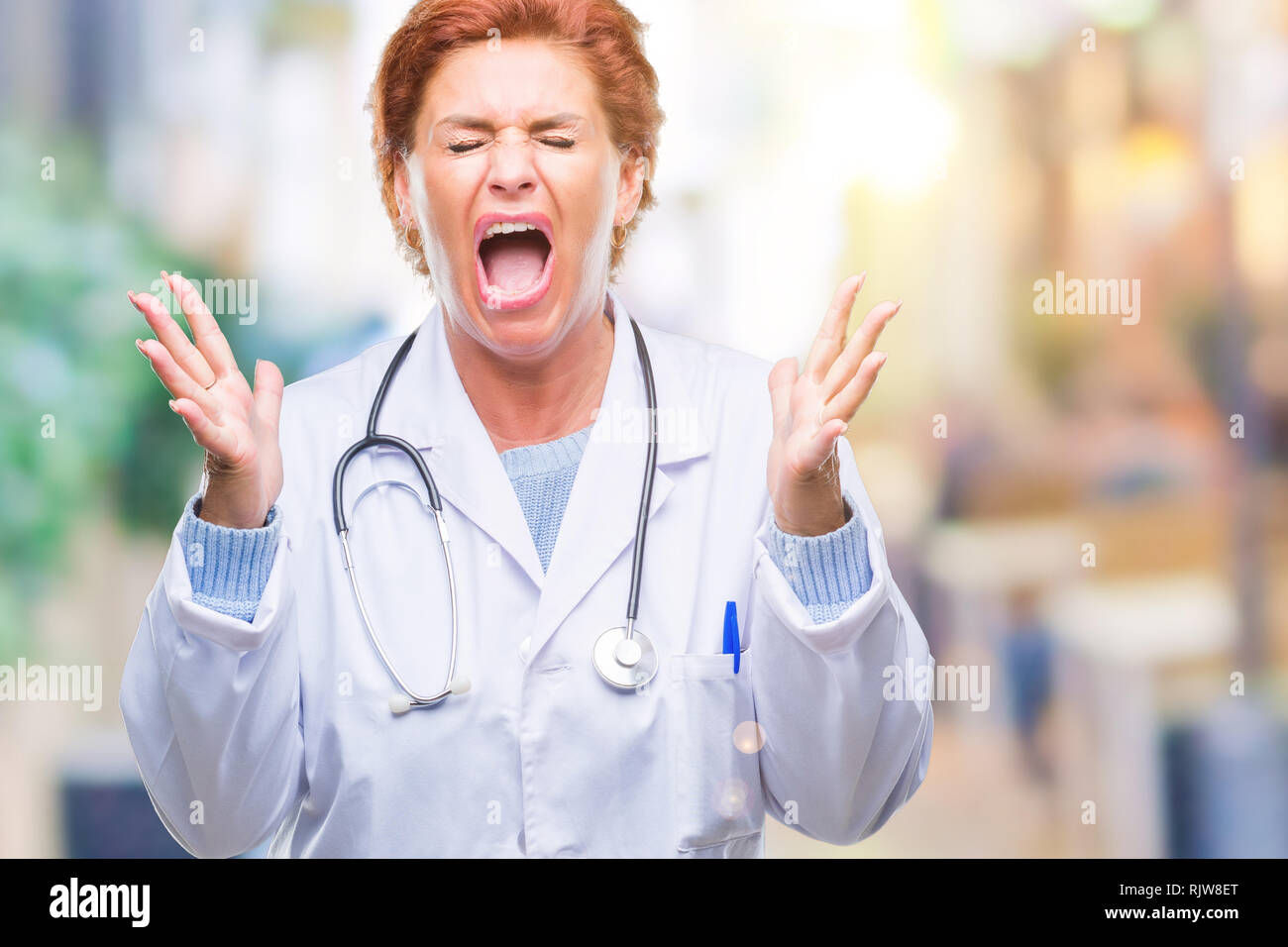 Senior caucasian doctor woman wearing medical uniform over isolated ...