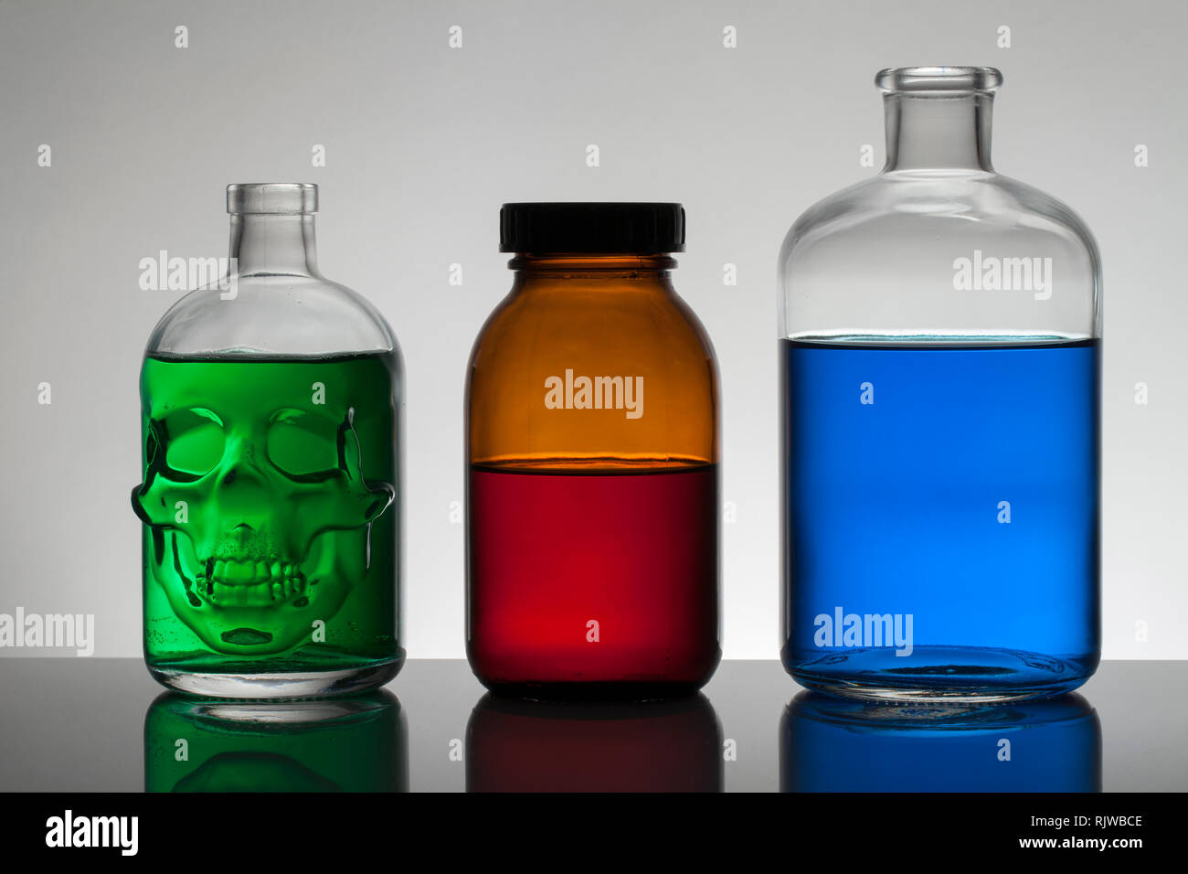 Liquid in laboratory bottles. Scientific biochemical laboratory ...