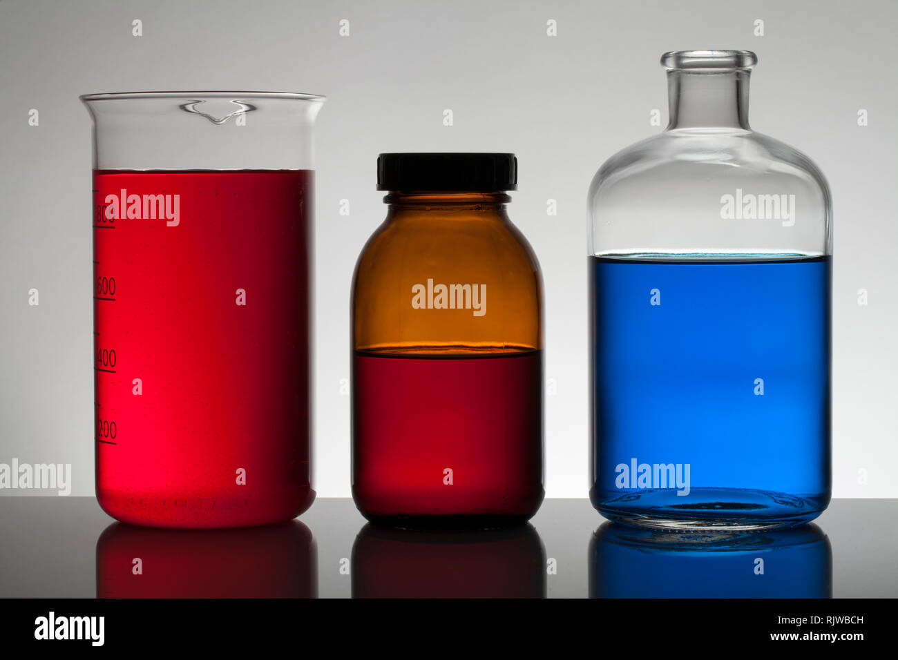 Liquid in laboratory bottles. Scientific biochemical laboratory ...