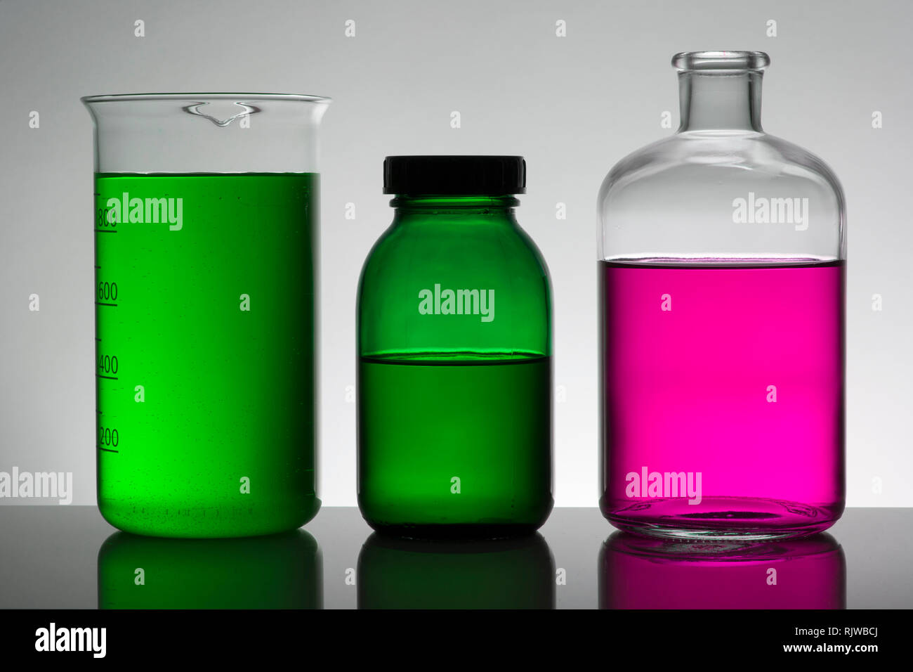 Liquid in laboratory bottles. Scientific biochemical laboratory ...