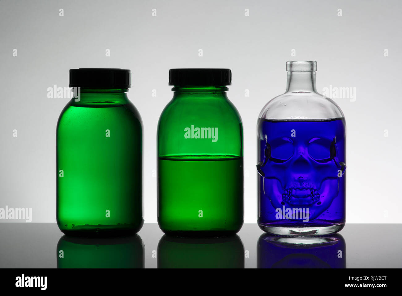 Liquid in laboratory bottles. Scientific biochemical laboratory ...