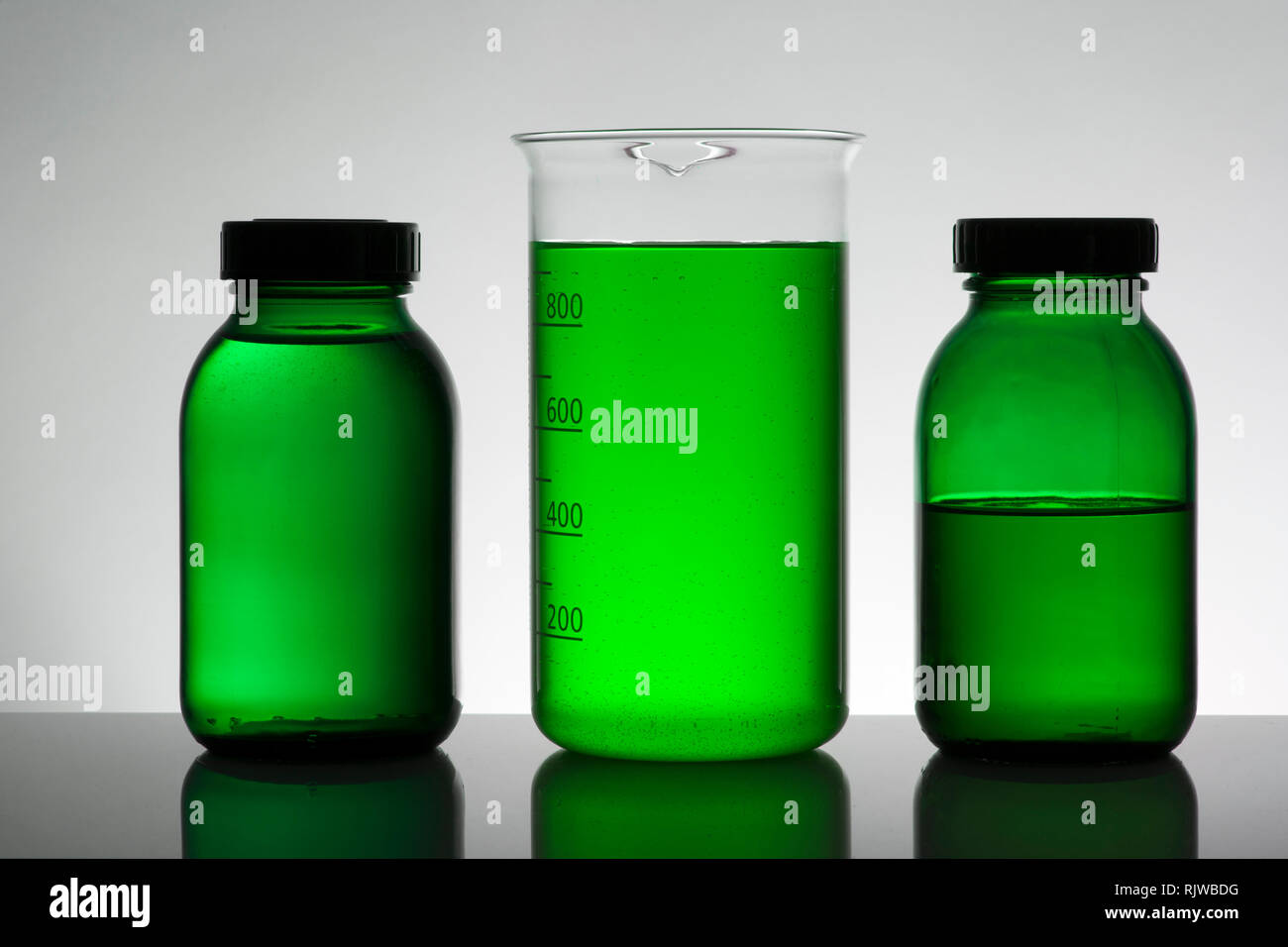 Liquid in laboratory bottles. Scientific biochemical laboratory ...