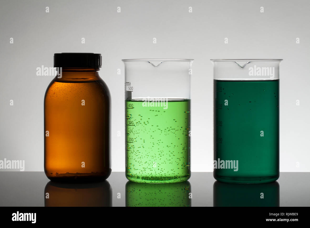 Liquid in laboratory bottles. Scientific biochemical laboratory ...